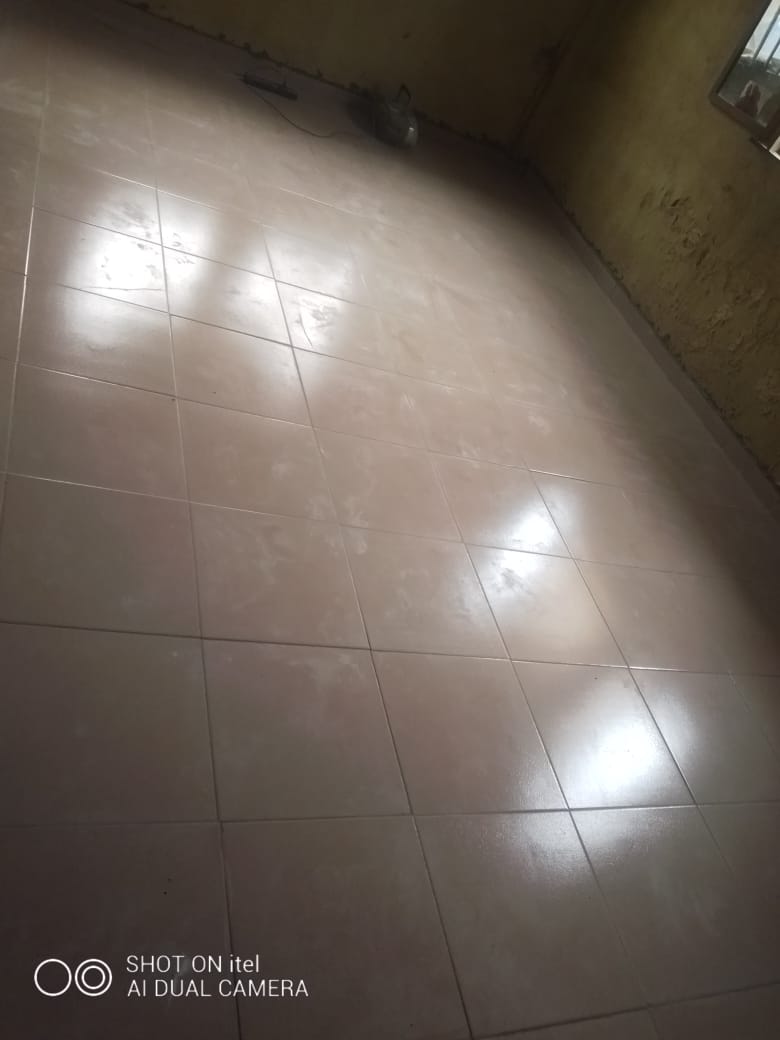 Ollam Tiles Installation and flooring concept - Construct Ng